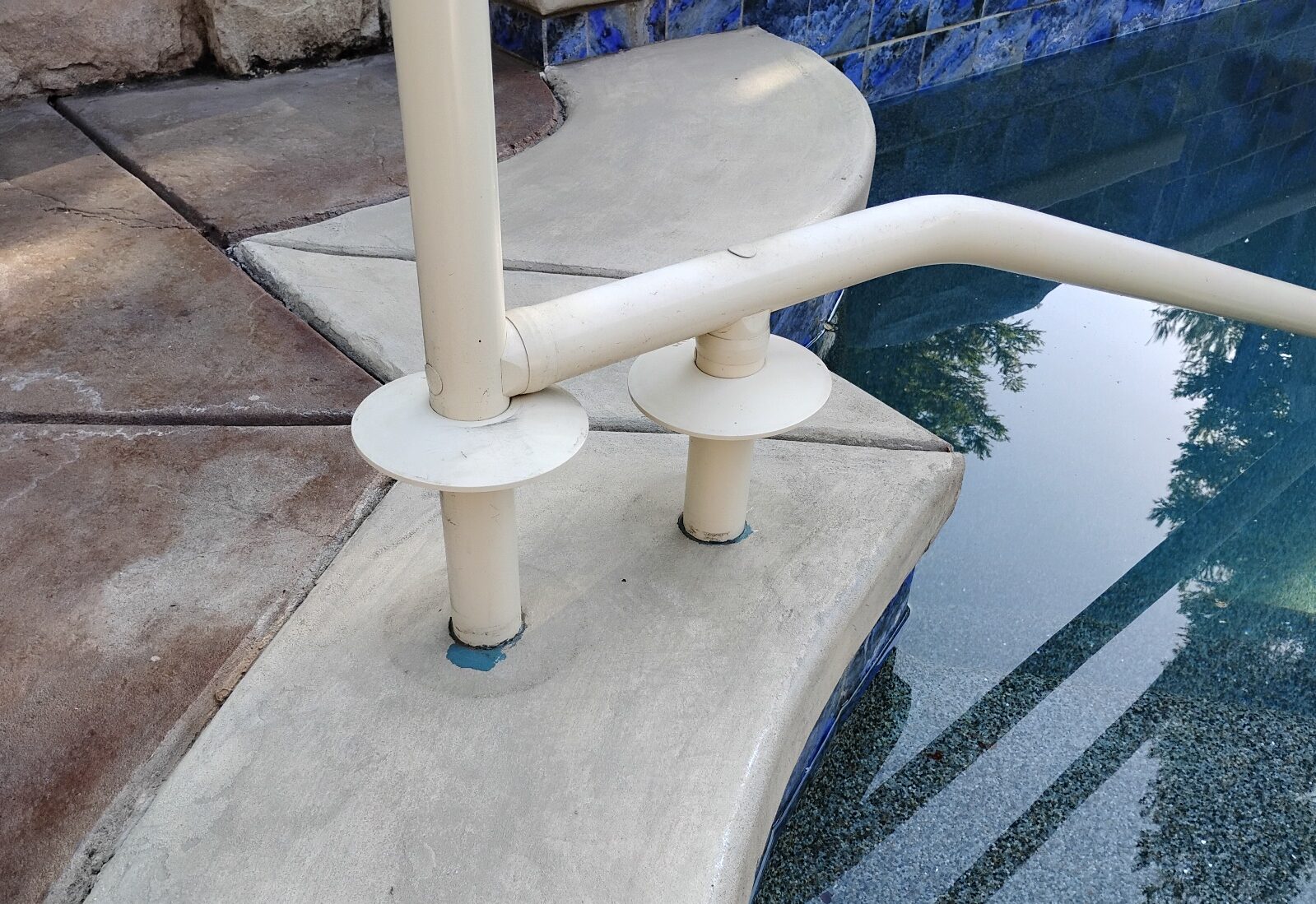 Which is Better? A Swimming Pool Handrail with or without Anchors ...